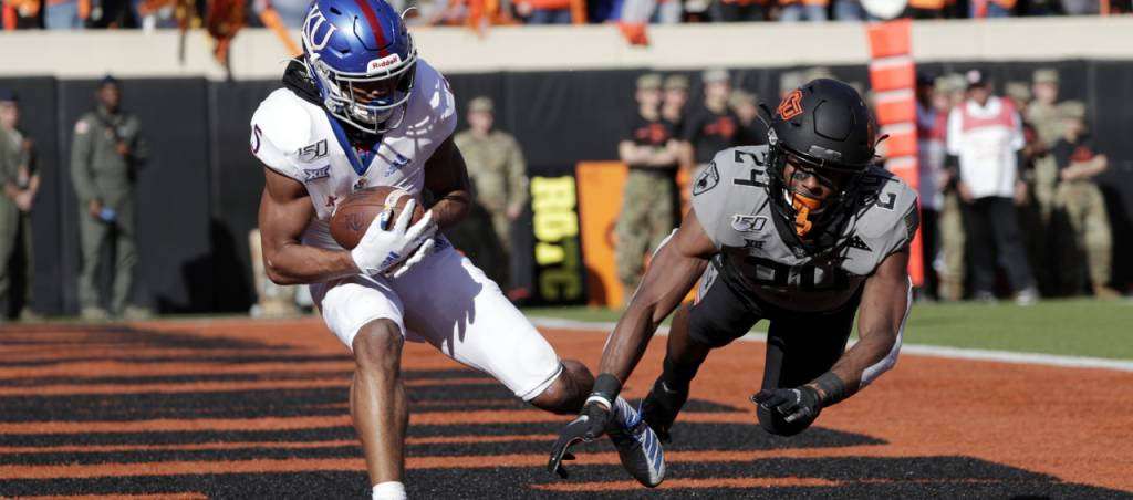 Hubbard leads No. 25 Oklahoma St. past Kansas 31-13