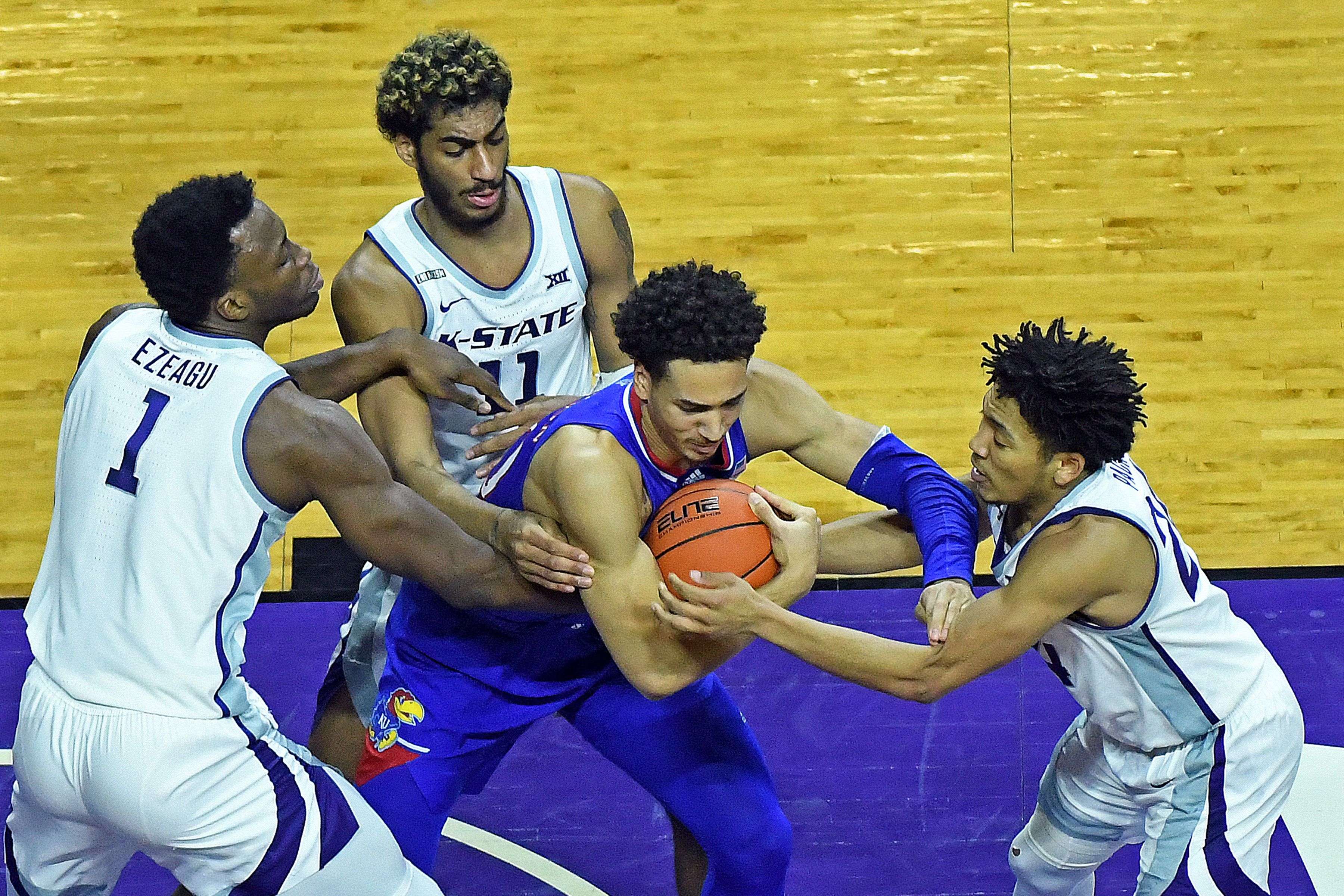 🏀 Garrett, Wilson lead No. 23 Kansas past Kansas Stat