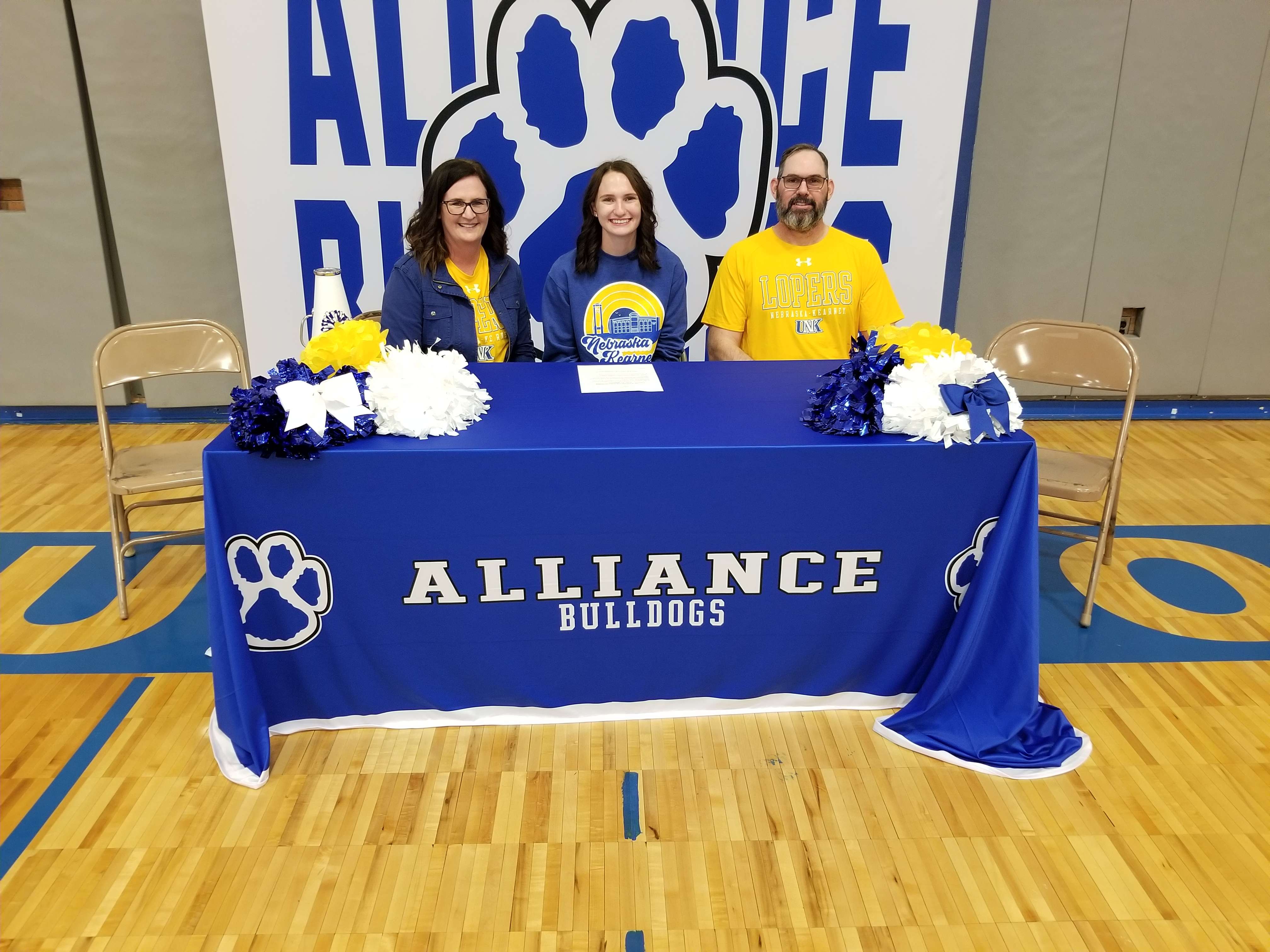 AHS Senior Riley Lawrence signs to join Cheer Squad at UNK