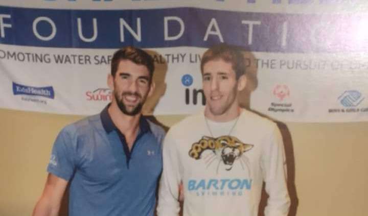 Great Bend swimmer meets Olympic gold medalist Phelps...again