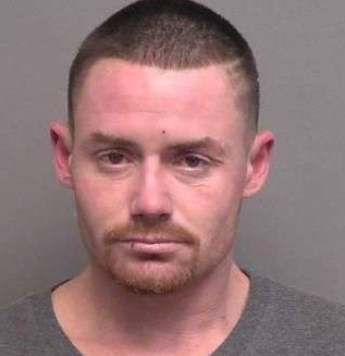 Wrecked car ends up on no-parking sign; Salina man arrested