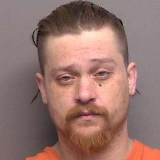 Salina man with active warrants arrested early Sunday morning